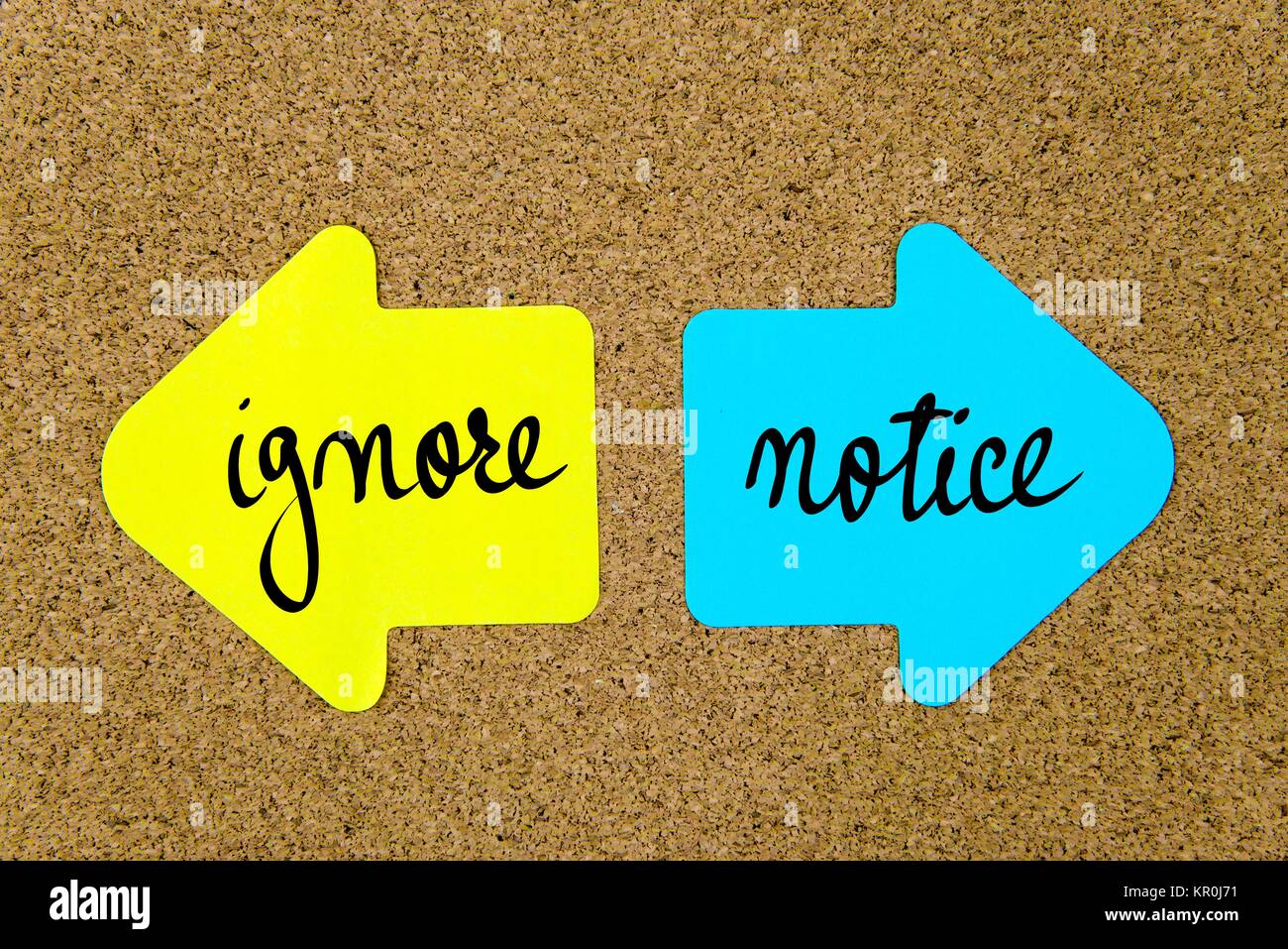 Message Ignore versus Notice Stock Photo - Alamy