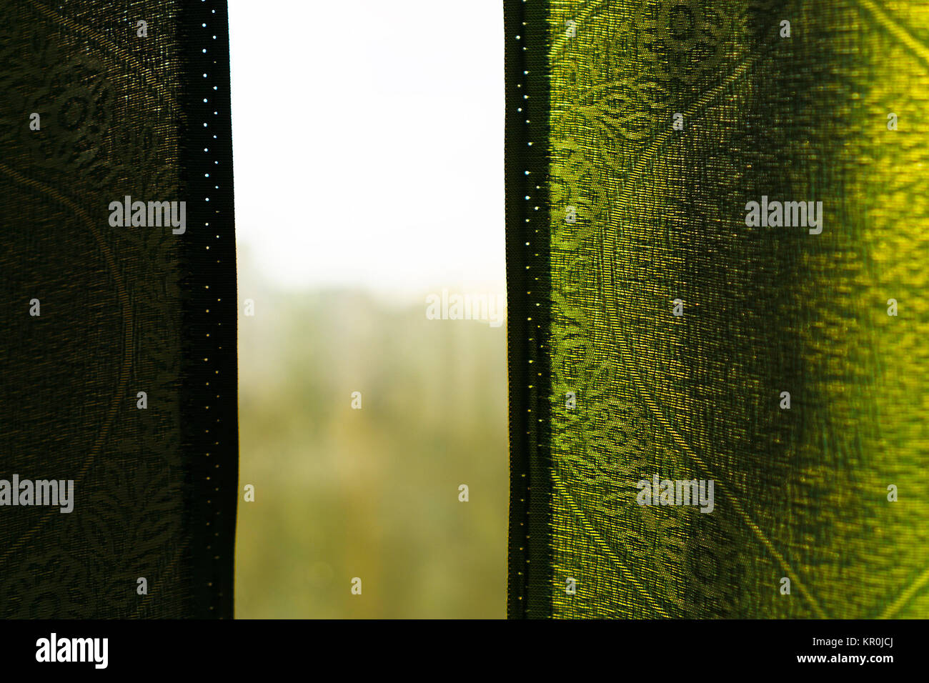 View through window with green curtains background Stock Photo - Alamy