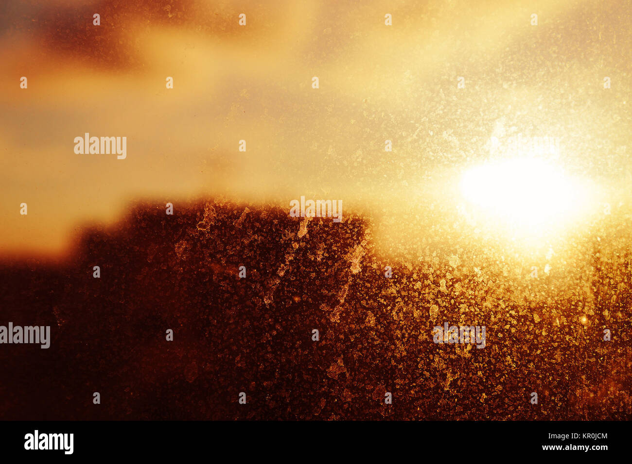 View on city through dirty window with orange light leak backdro Stock ...