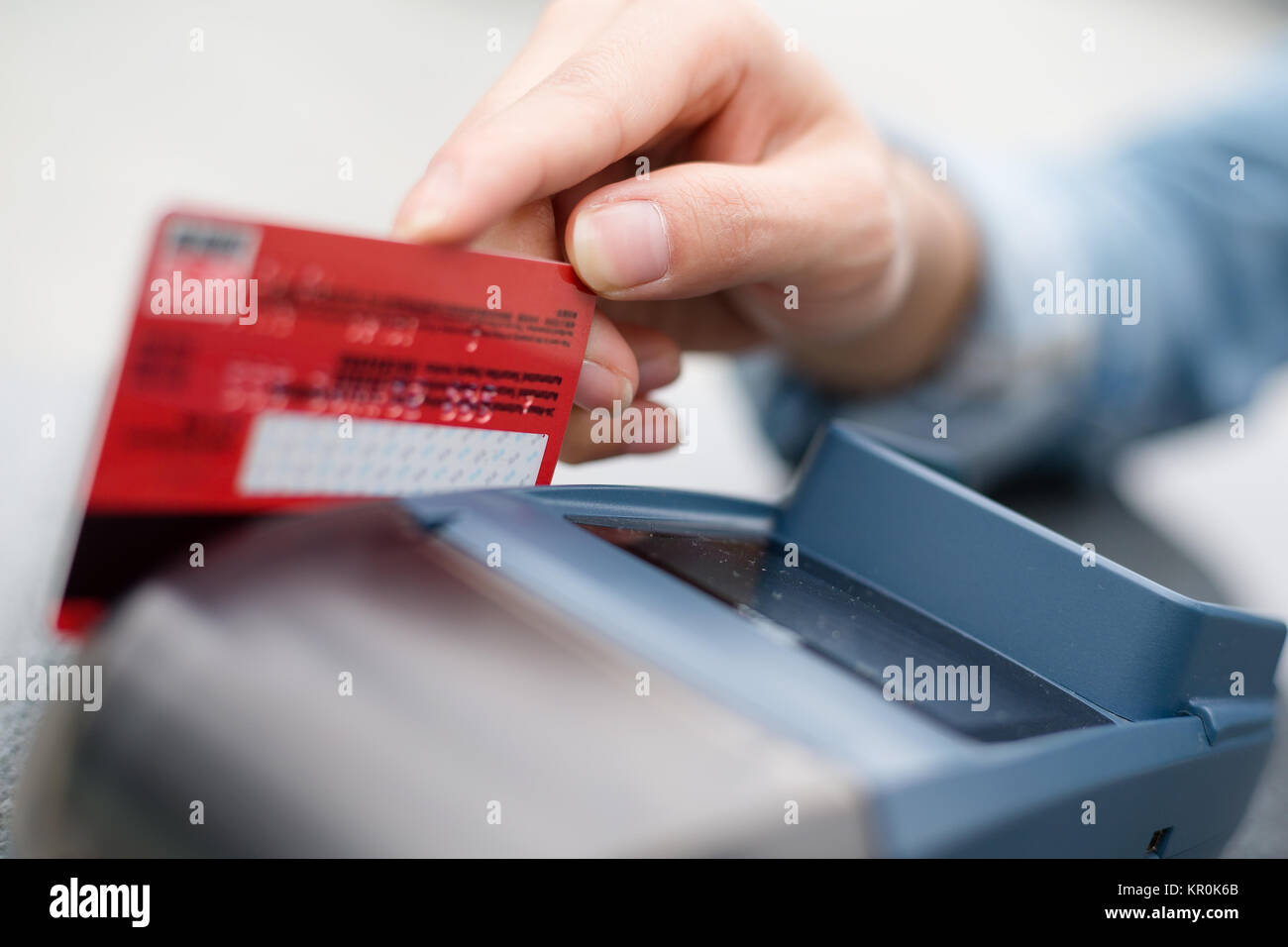 Hand Swiping Credit Card In Store Stock Photo - Alamy