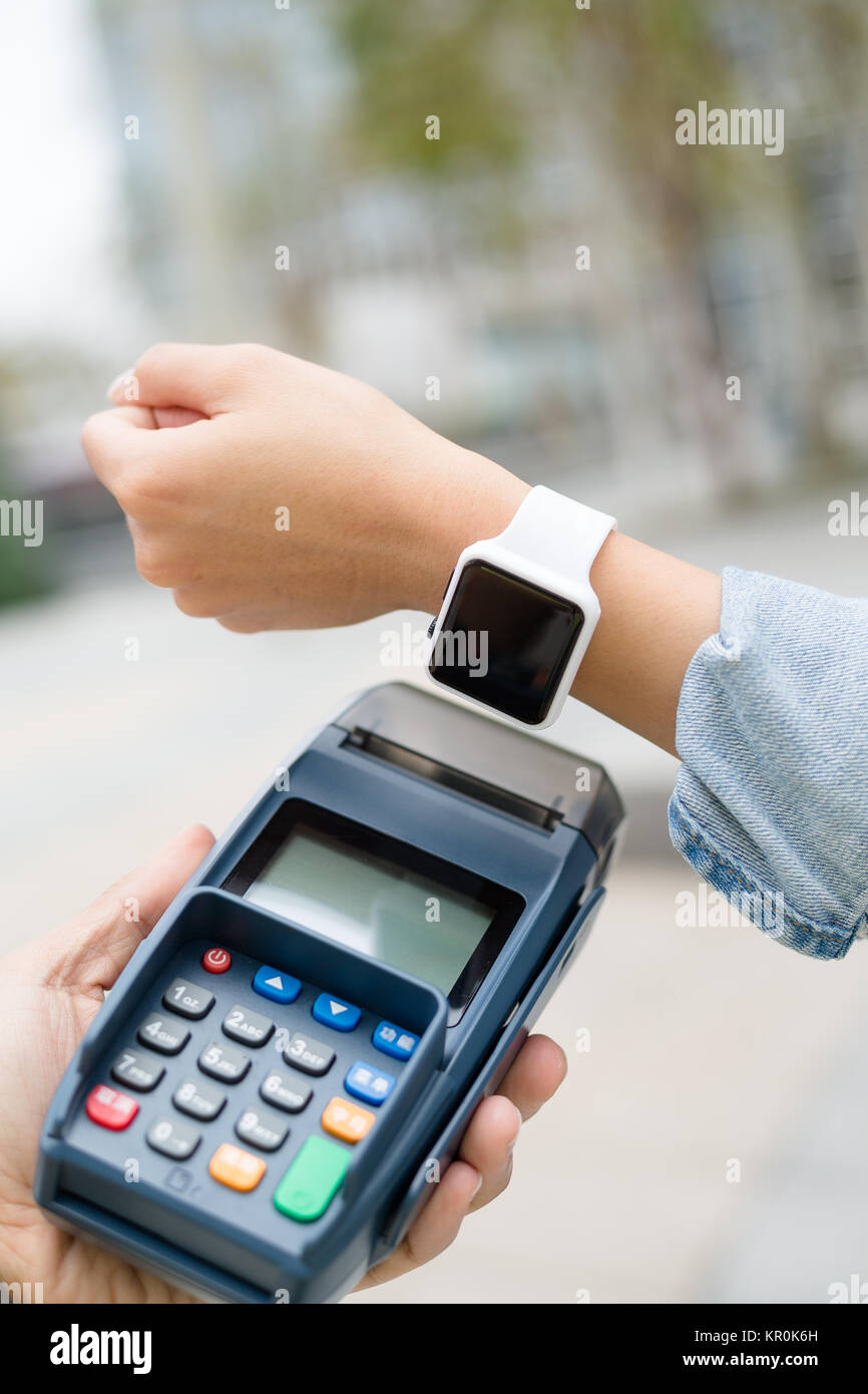 Female pay smart watch hi-res stock photography and images - Alamy