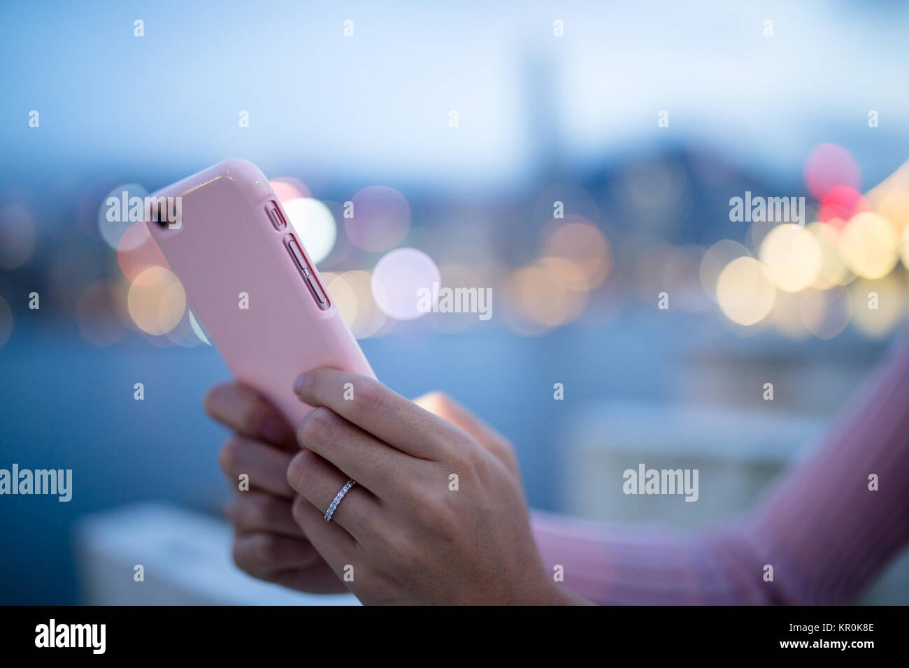 Woman use of cellphone at night Stock Photo - Alamy