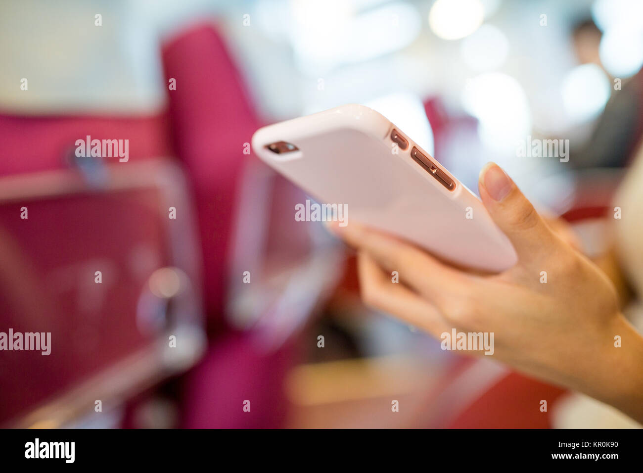 Woman using cellphone on ship Stock Photo - Alamy