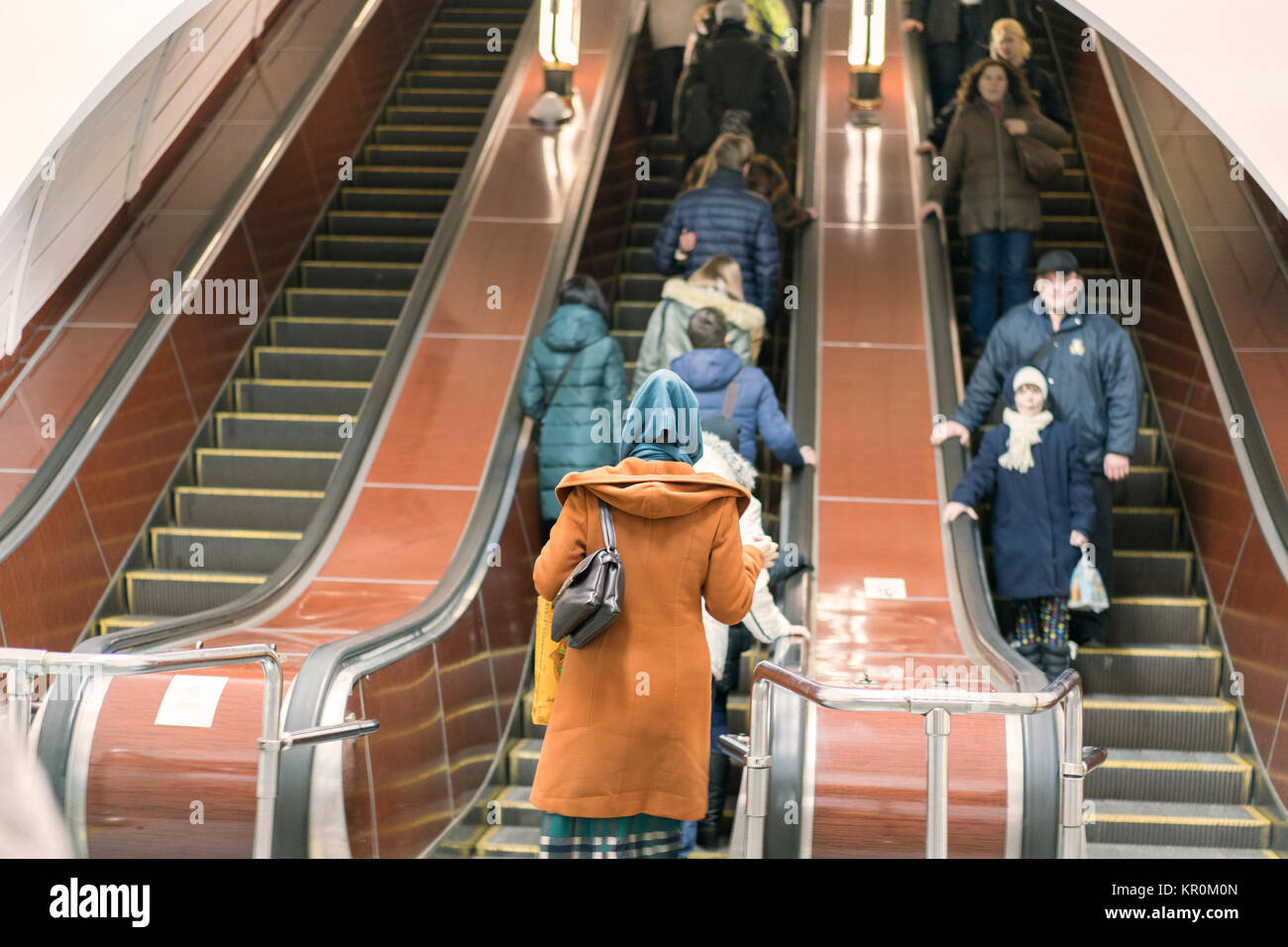 People on the escalator Stock Photo - Alamy