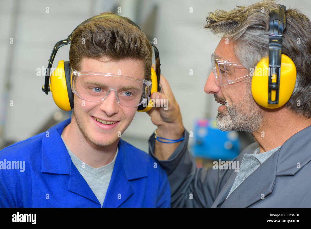 testing the ear muffs Stock Photo - Alamy