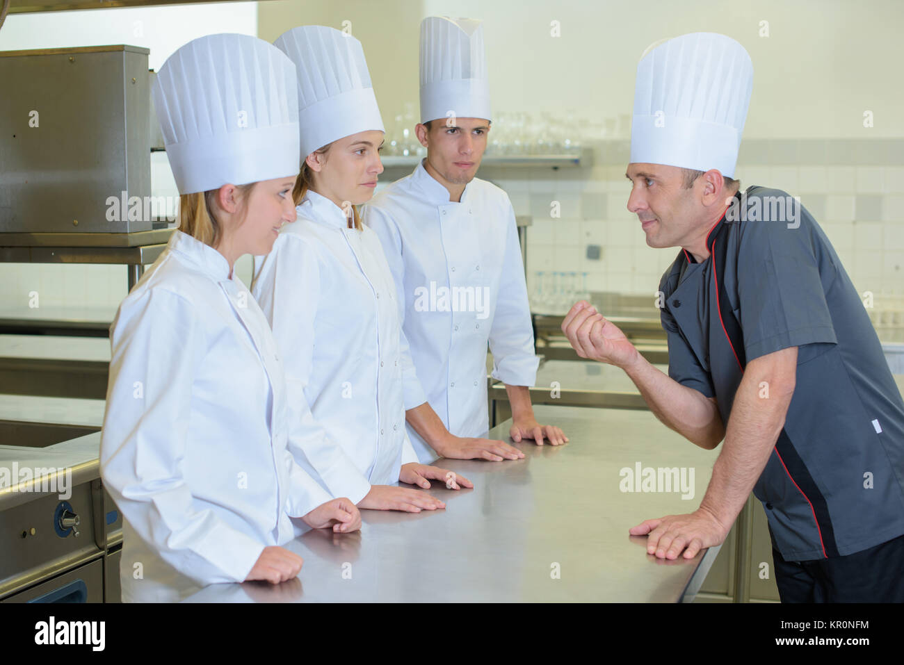 giving a lecture in the kitchen Stock Photo - Alamy