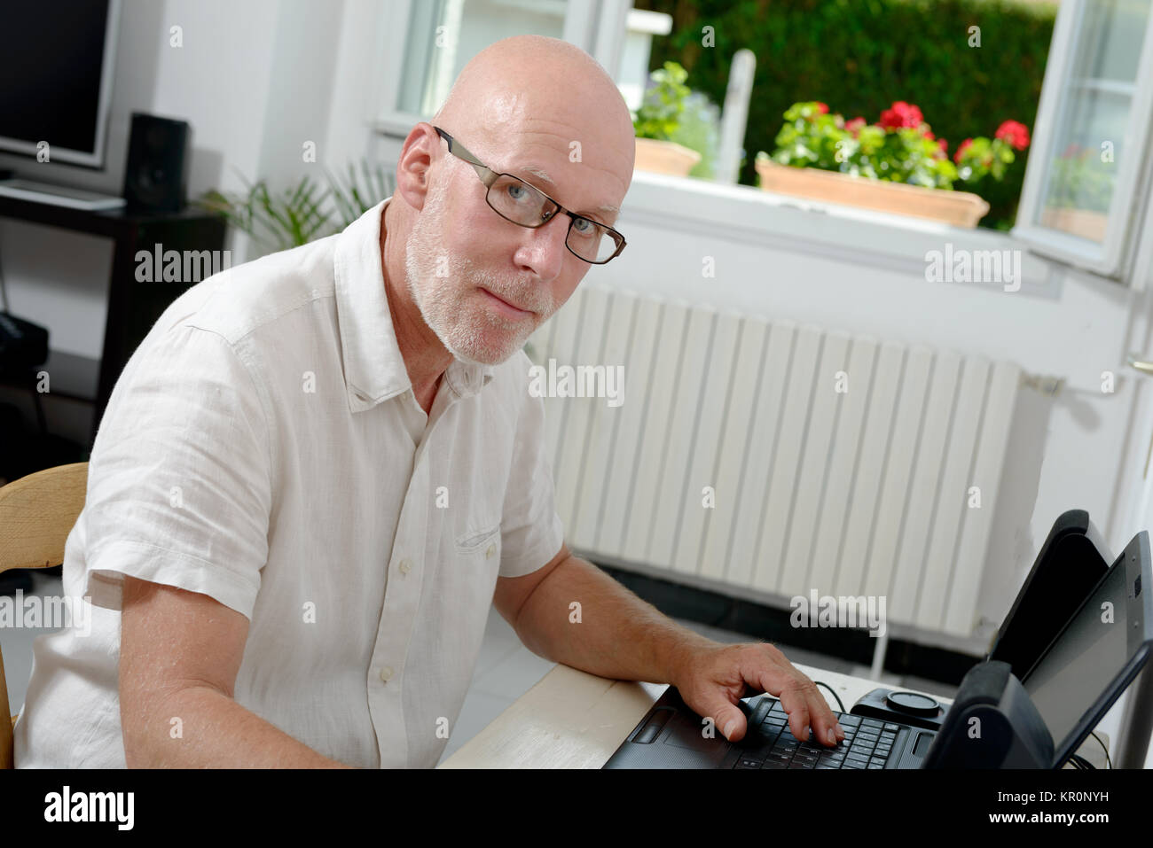 portrait of a middle age man with laptop Stock Photo - Alamy