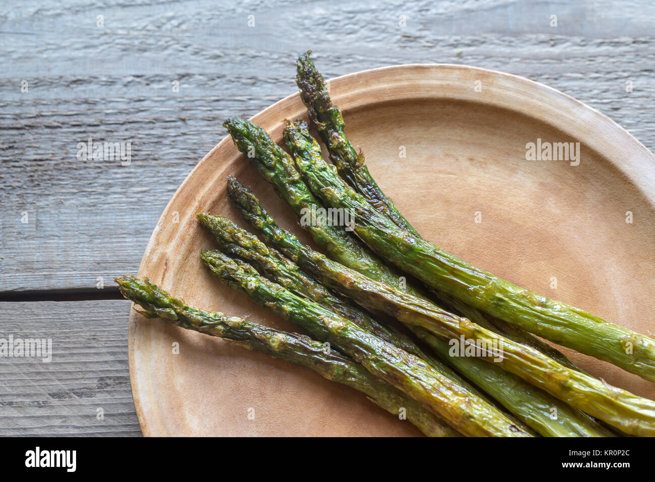 Roasted asparagus on the plate Stock Photo - Alamy