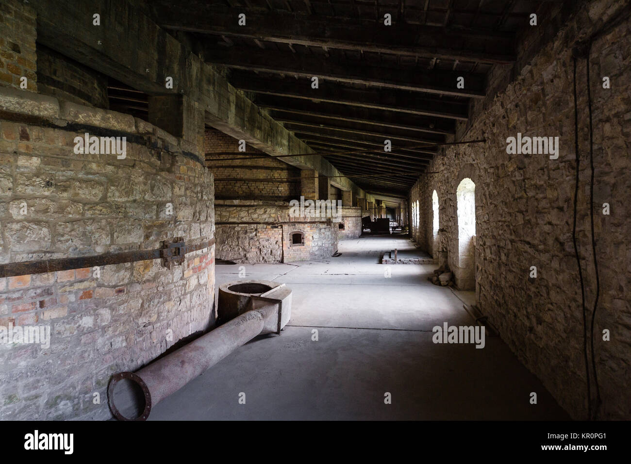 Industrial interior of an old factory building with brick walls Stock ...