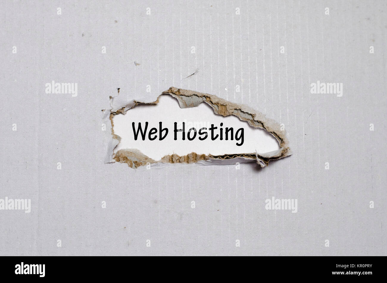 The word web hosting appearing behind torn paper Stock Photo - Alamy