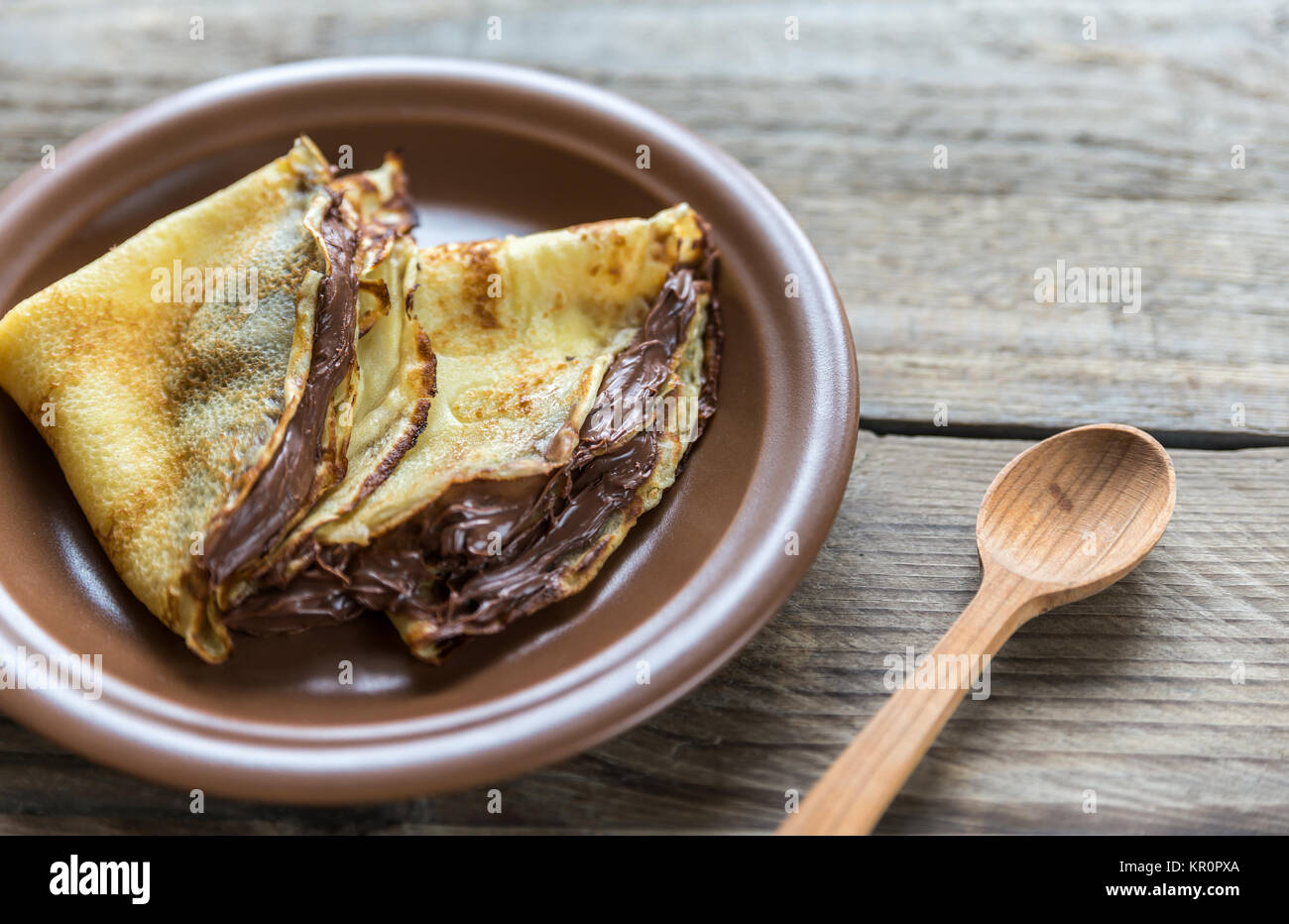 Crepes dark chocolate sauce hi-res stock photography and images - Alamy