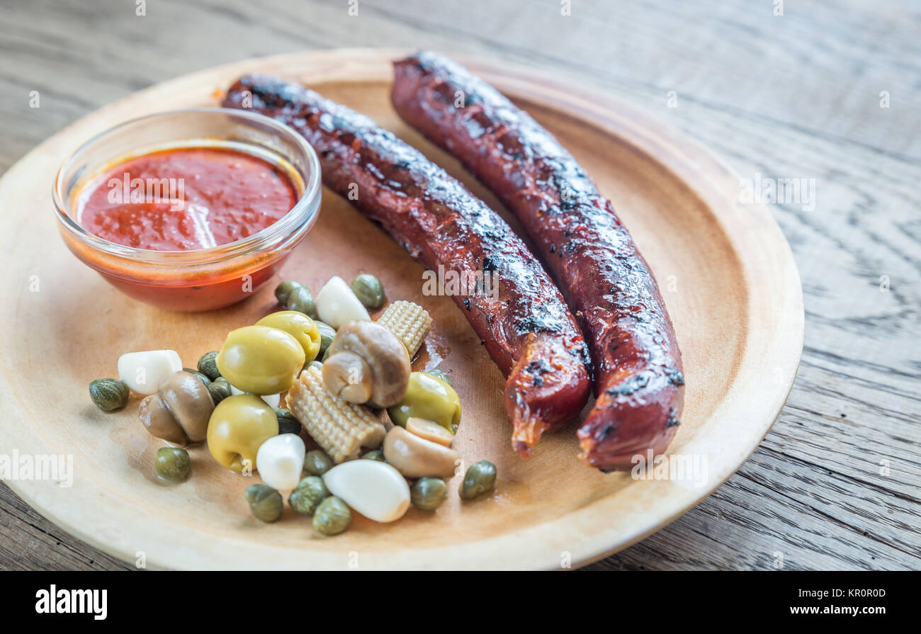 Grilled sausages on the plate Stock Photo - Alamy