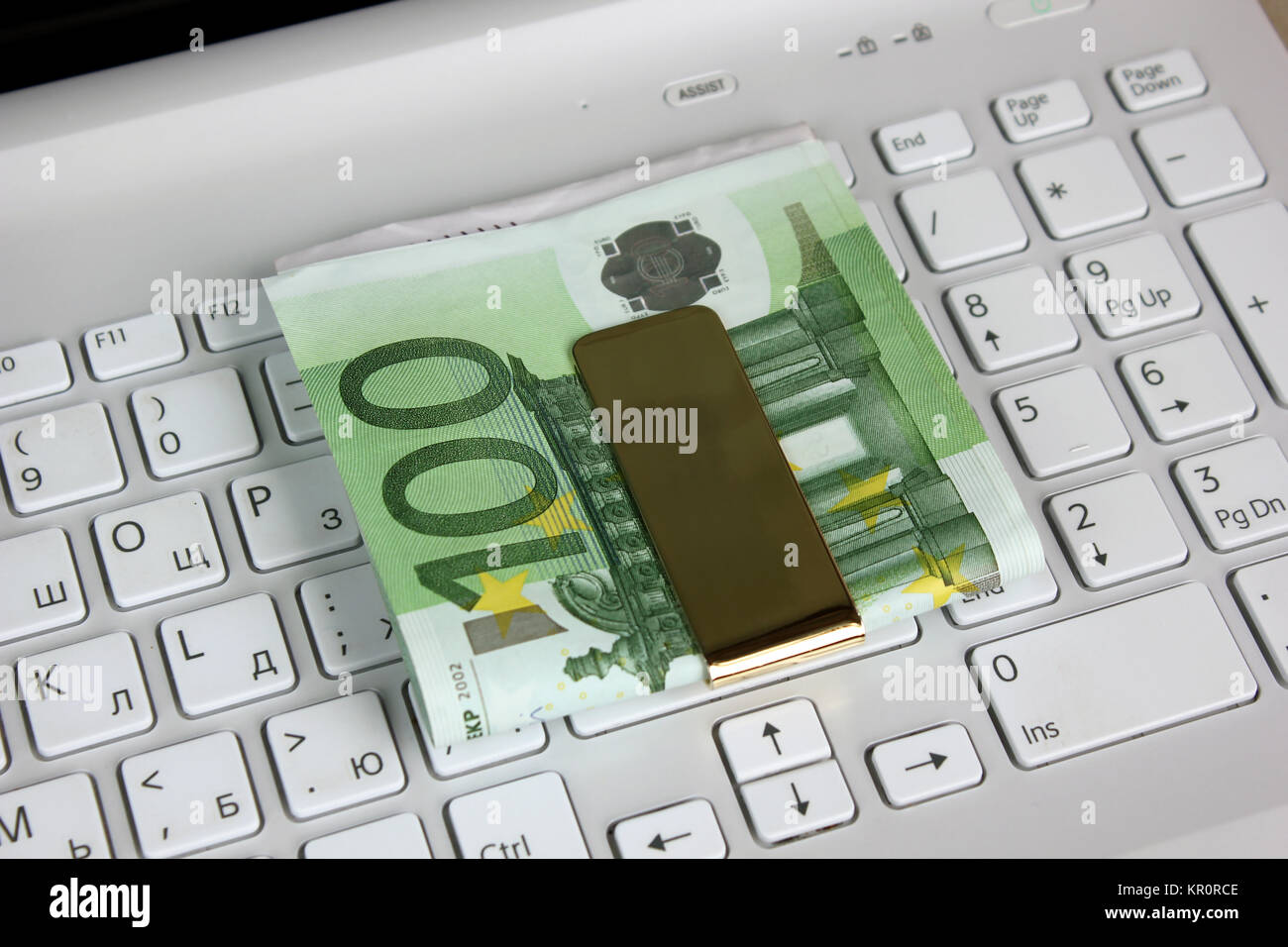 Euro and computer Stock Photo - Alamy
