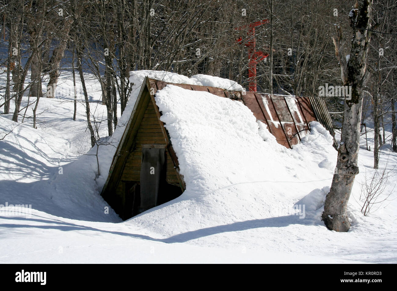 Snow-covered shed in the mountains of Caucasus Stock Photo - Alamy
