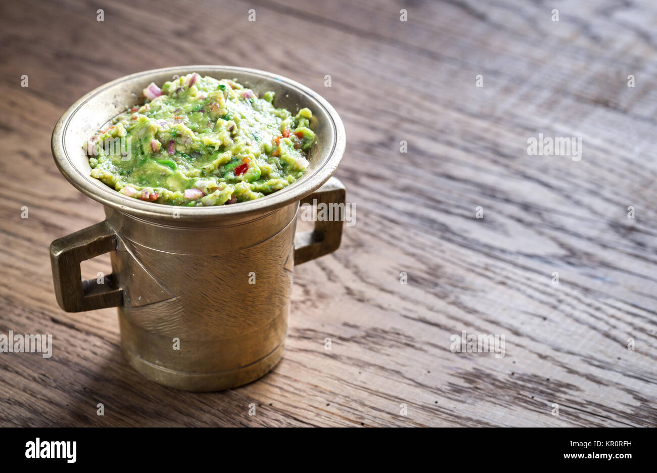 Bowl of guacamole Stock Photo - Alamy