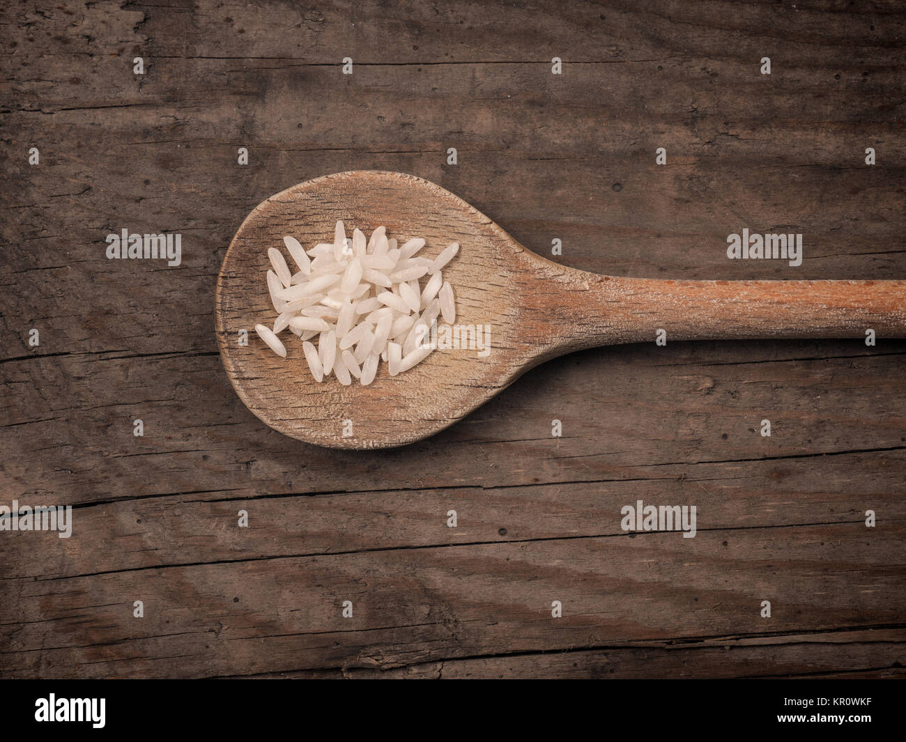 rice on a spoon Stock Photo - Alamy