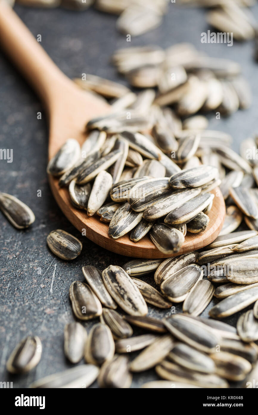 Unpeeled sunflower seeds Stock Photo - Alamy