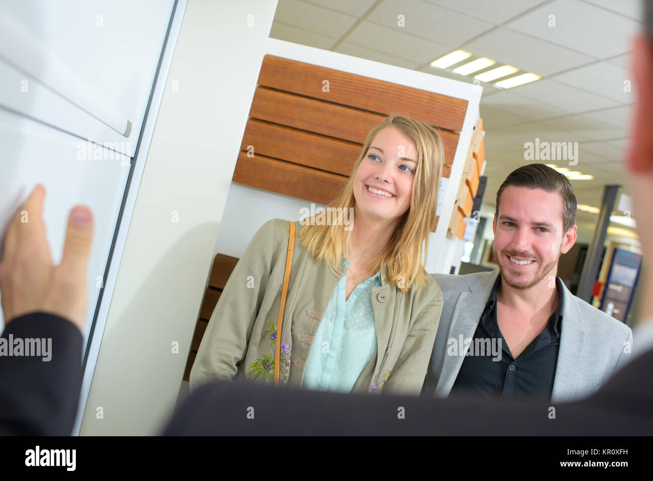Handsome customer model fitting hi-res stock photography and images - Alamy
