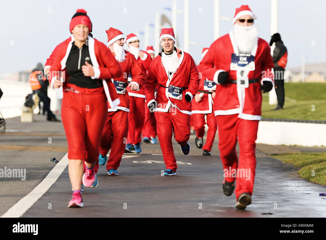 Pictured: Runners in Santa Claus fancy dress take part in this year's ...