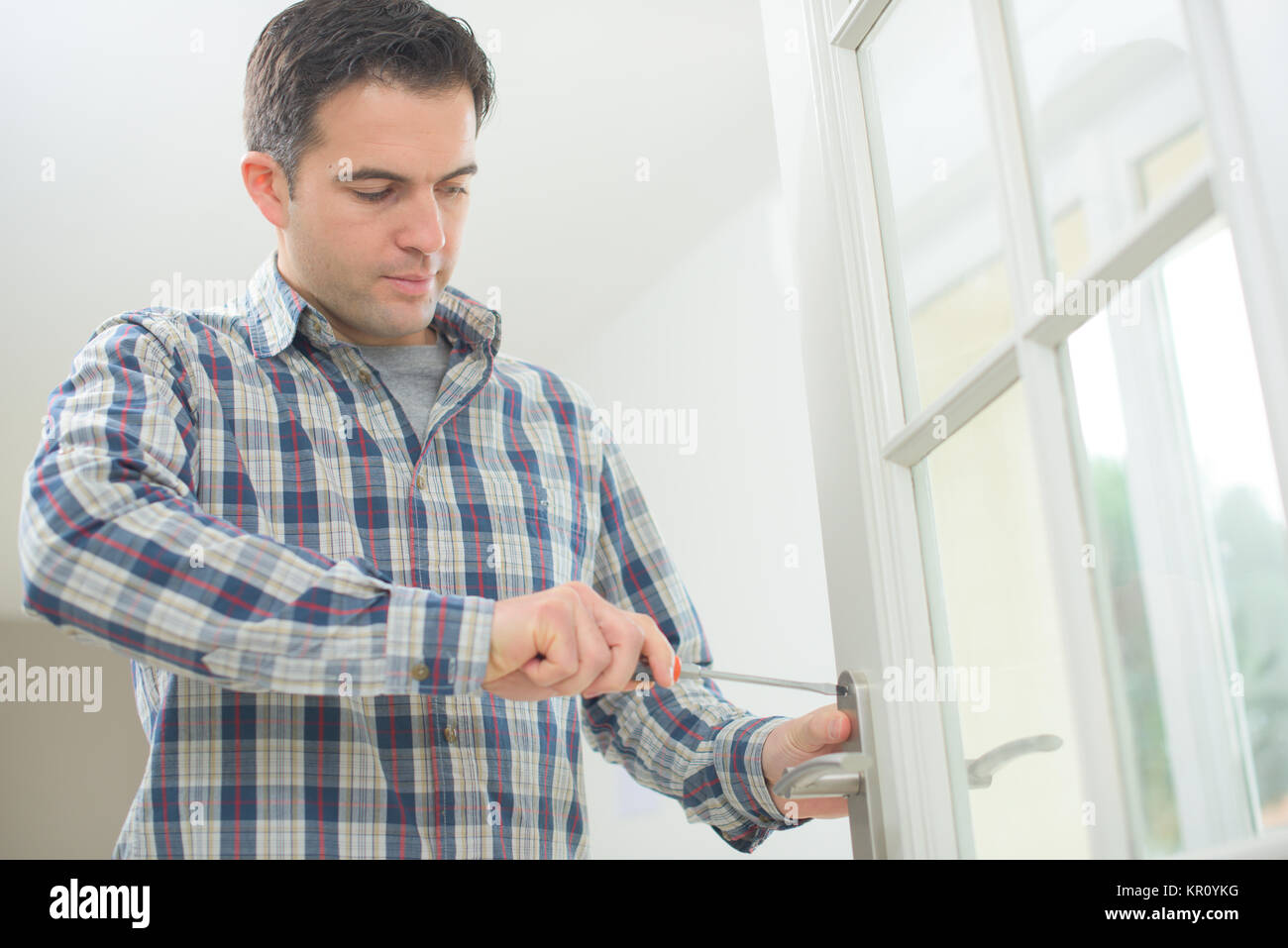 Construction workers fitting safety hi-res stock photography and images ...