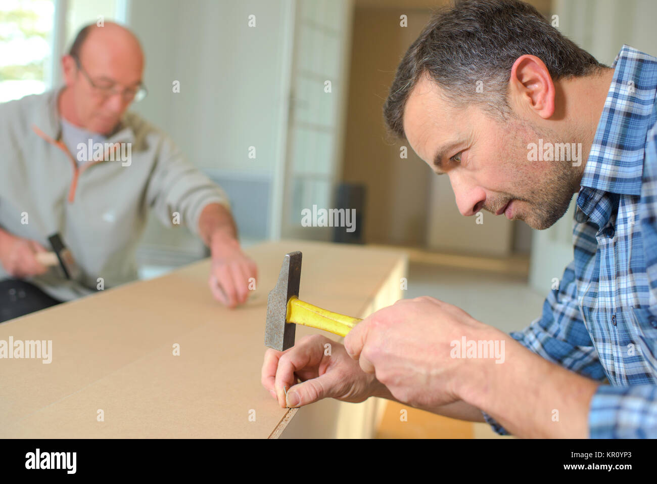 Carpetners at work Stock Photo - Alamy