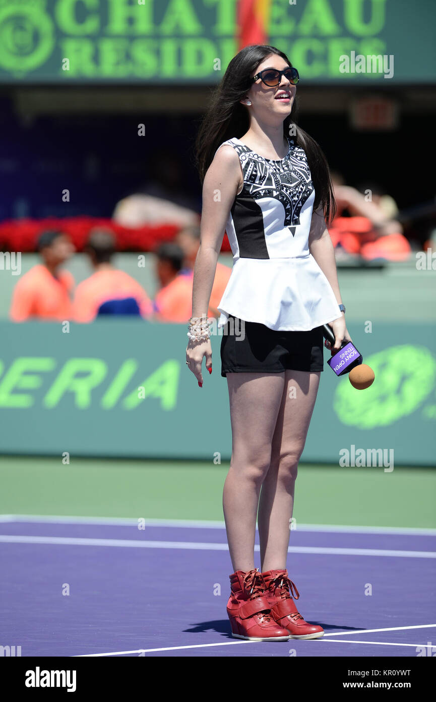KEY BISCAYNE, FL - MARCH 30: Elizabeth Elias sings the national anthem ...