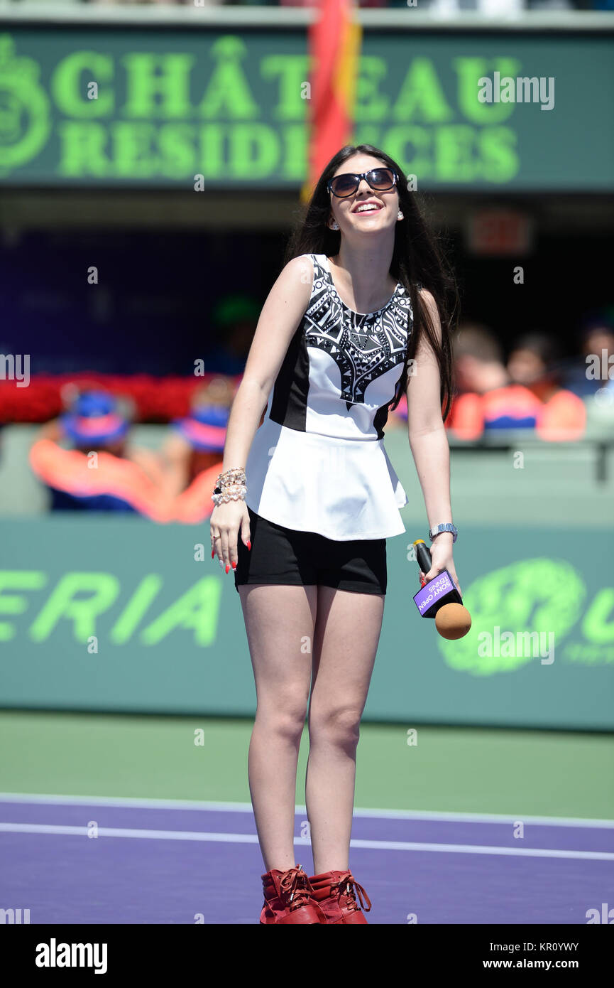 KEY BISCAYNE, FL - MARCH 30: Elizabeth Elias sings the national anthem ...