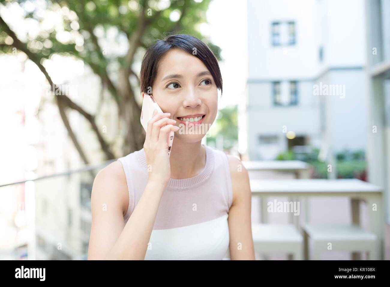 Woman pick up a call Stock Photo - Alamy