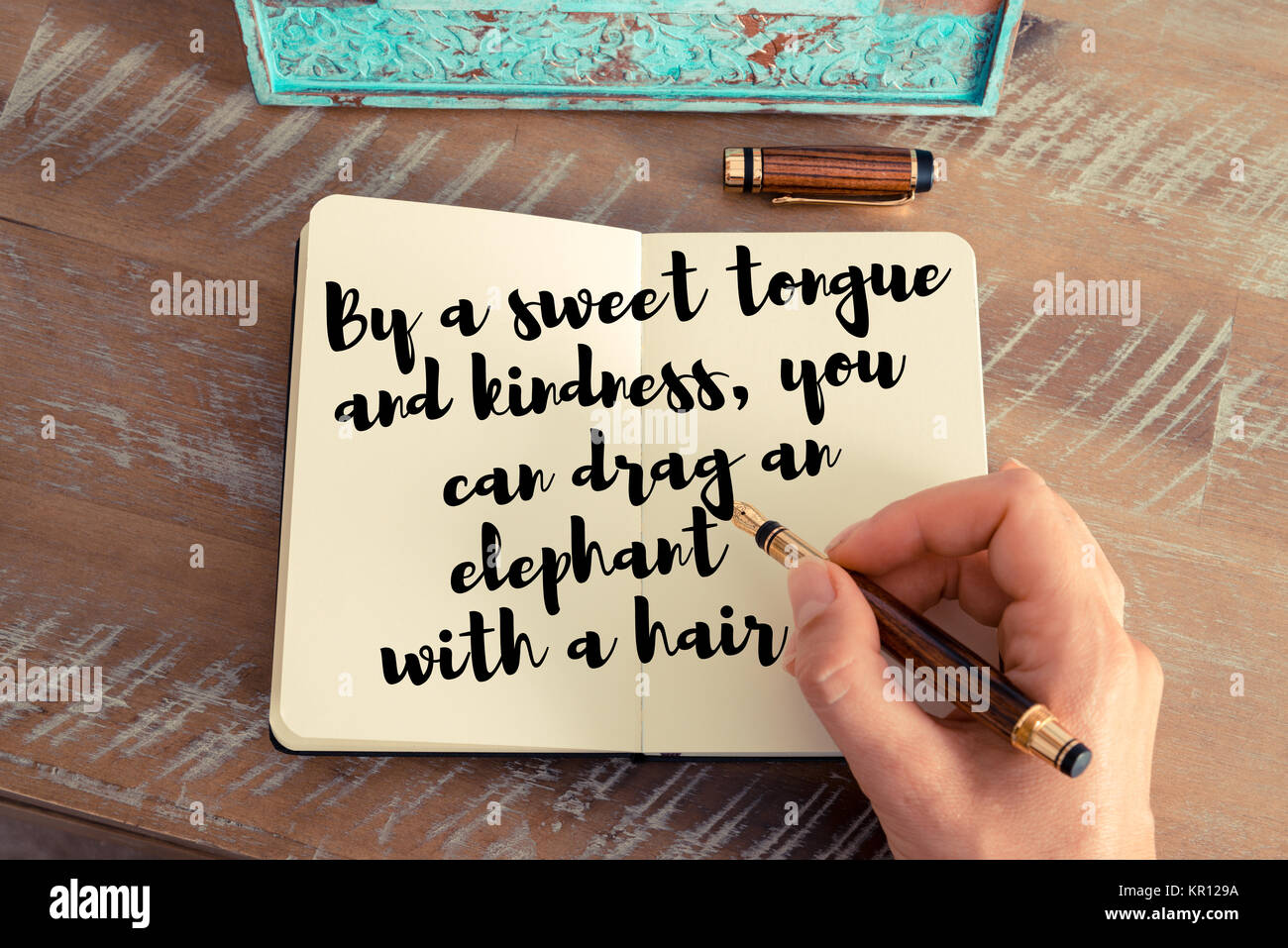 Handwritten quote as inspirational concept image Stock Photo - Alamy