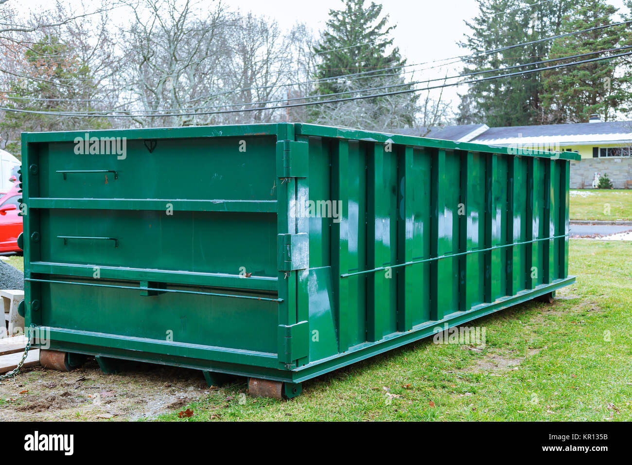 Dumpster full garbage container full of blue garbage Stock Photo - Alamy