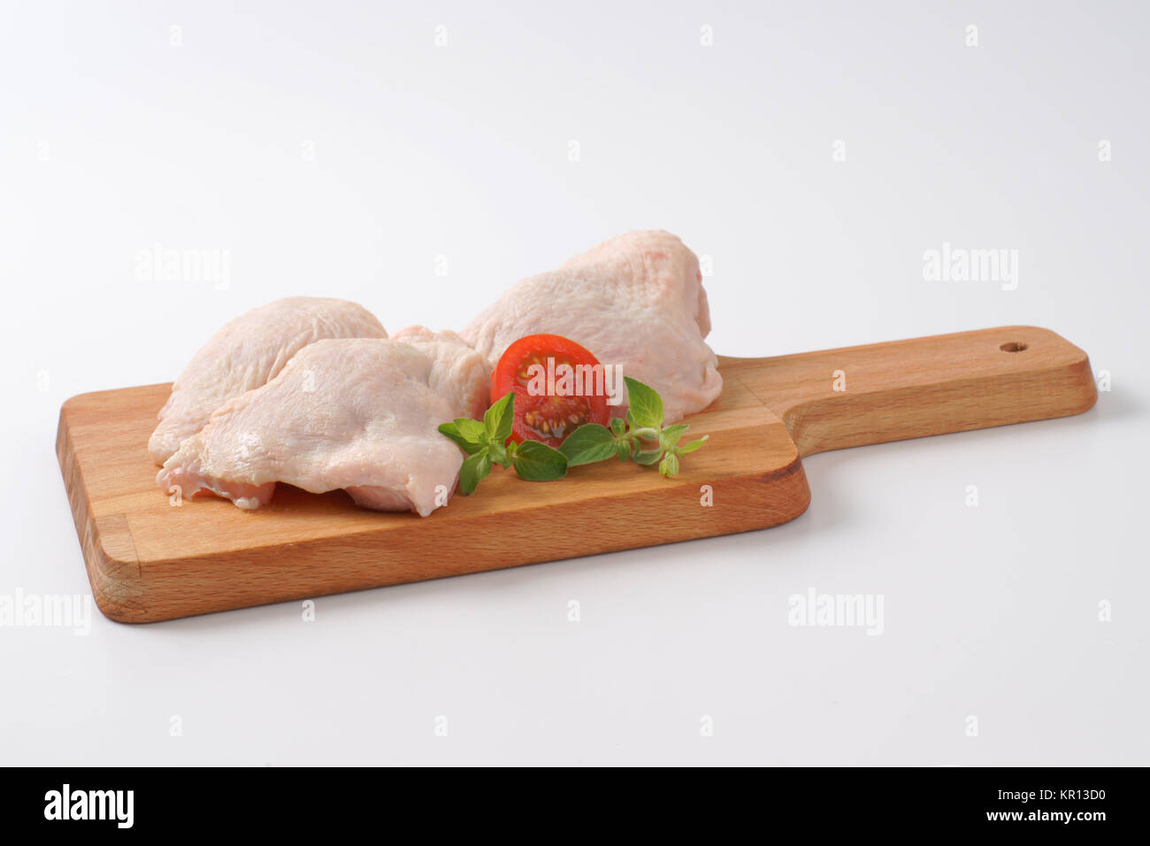 raw chicken thighs Stock Photo - Alamy