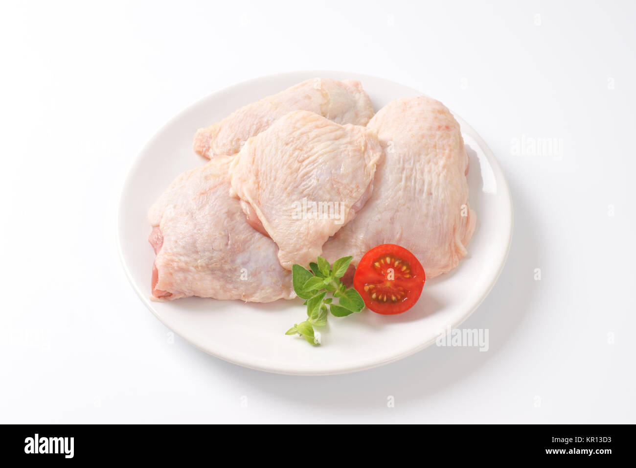 raw chicken thighs Stock Photo - Alamy