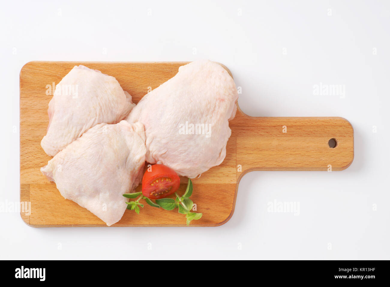 raw chicken thighs Stock Photo - Alamy