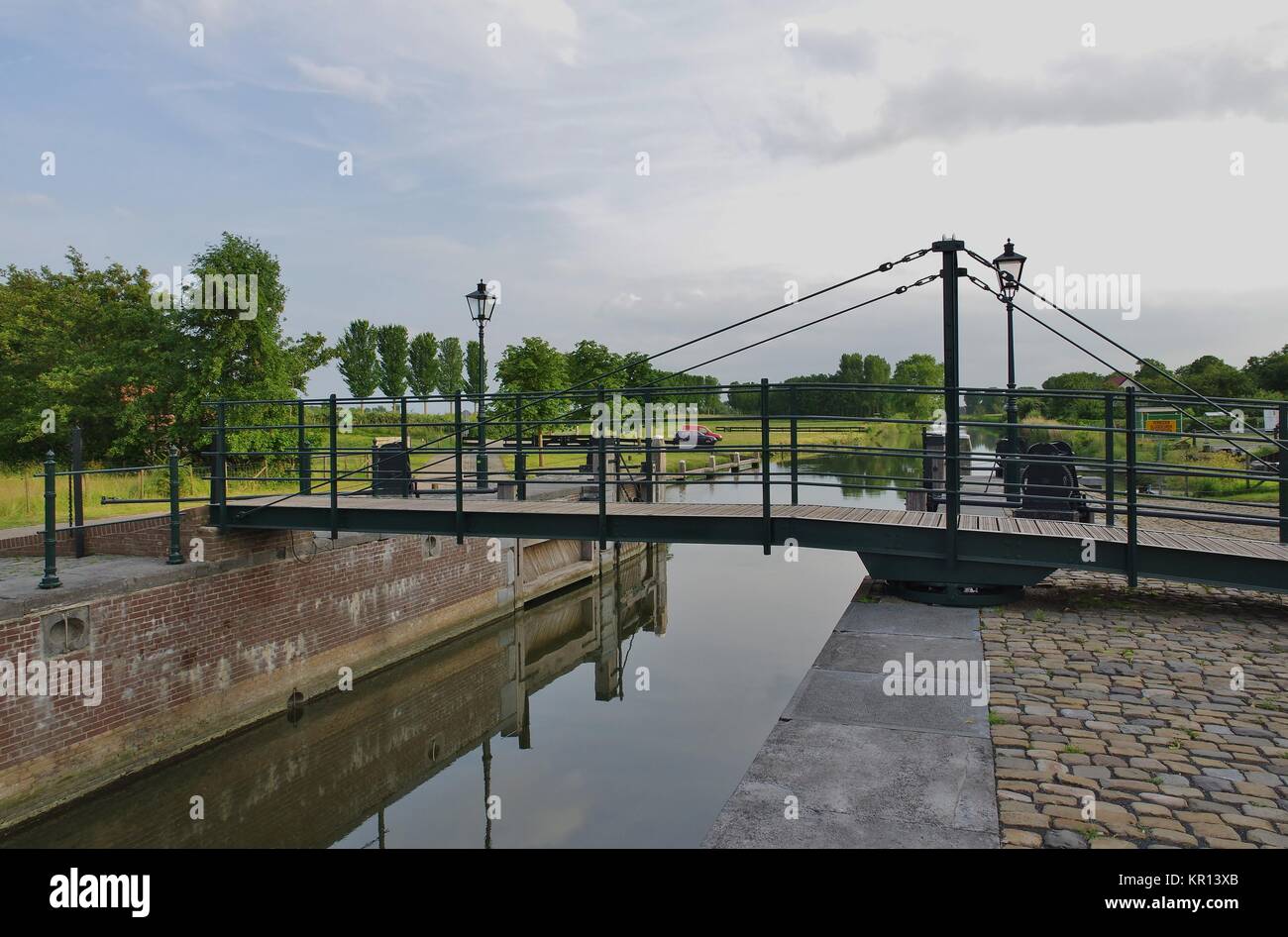swing bridge at the canal lock Stock Photo - Alamy