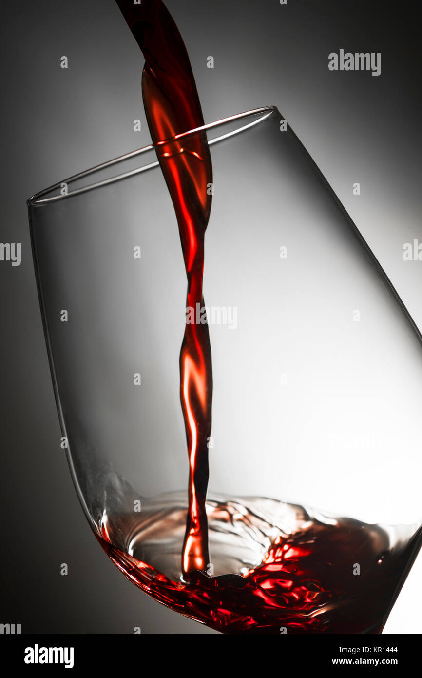 pour red wine Stock Photo - Alamy