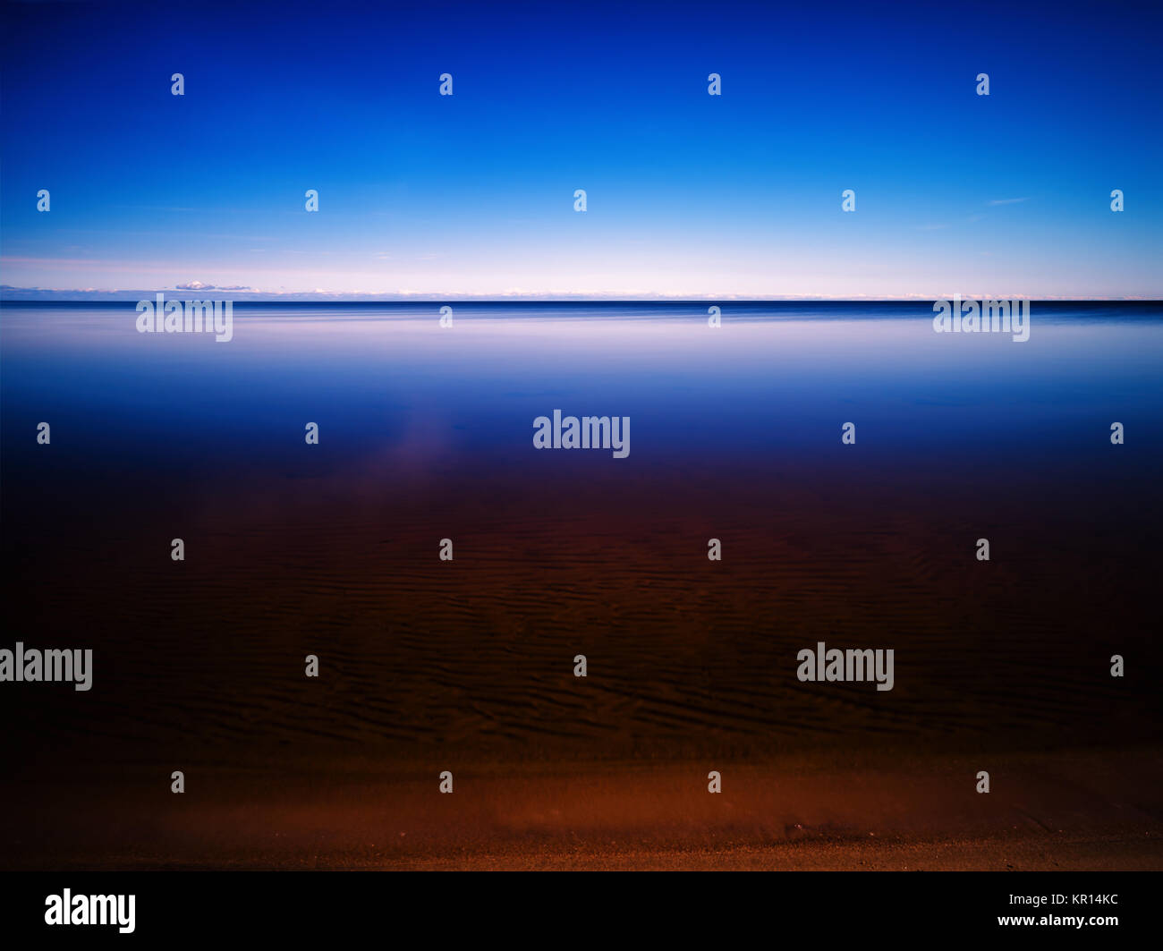 Clear morning at smooth mountain lake Stock Photo - Alamy