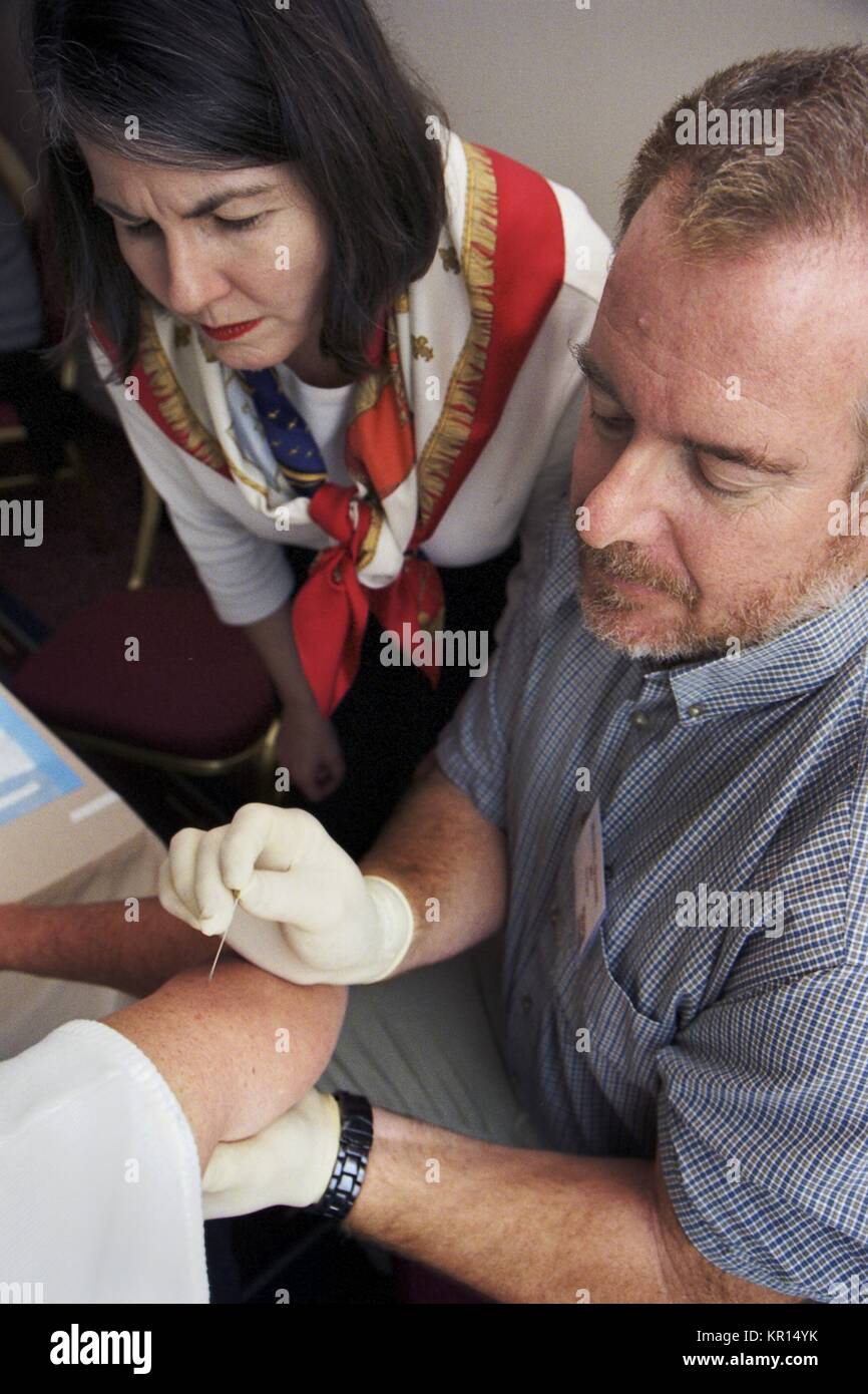 CDC Clinician, Melanie King, RN, observes proper technique with a ...