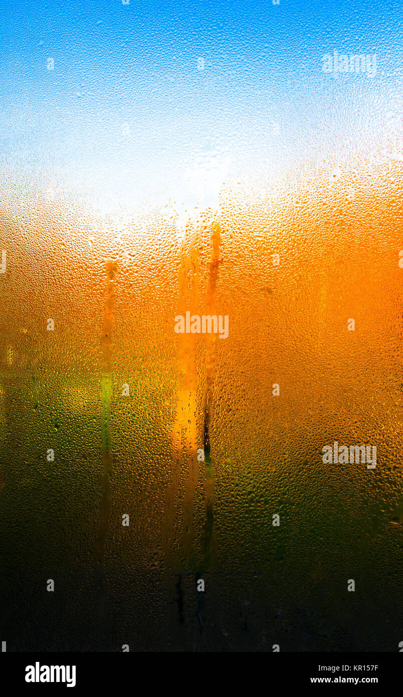 Vertical vivid rain drops tears on window Stock Photo - Alamy