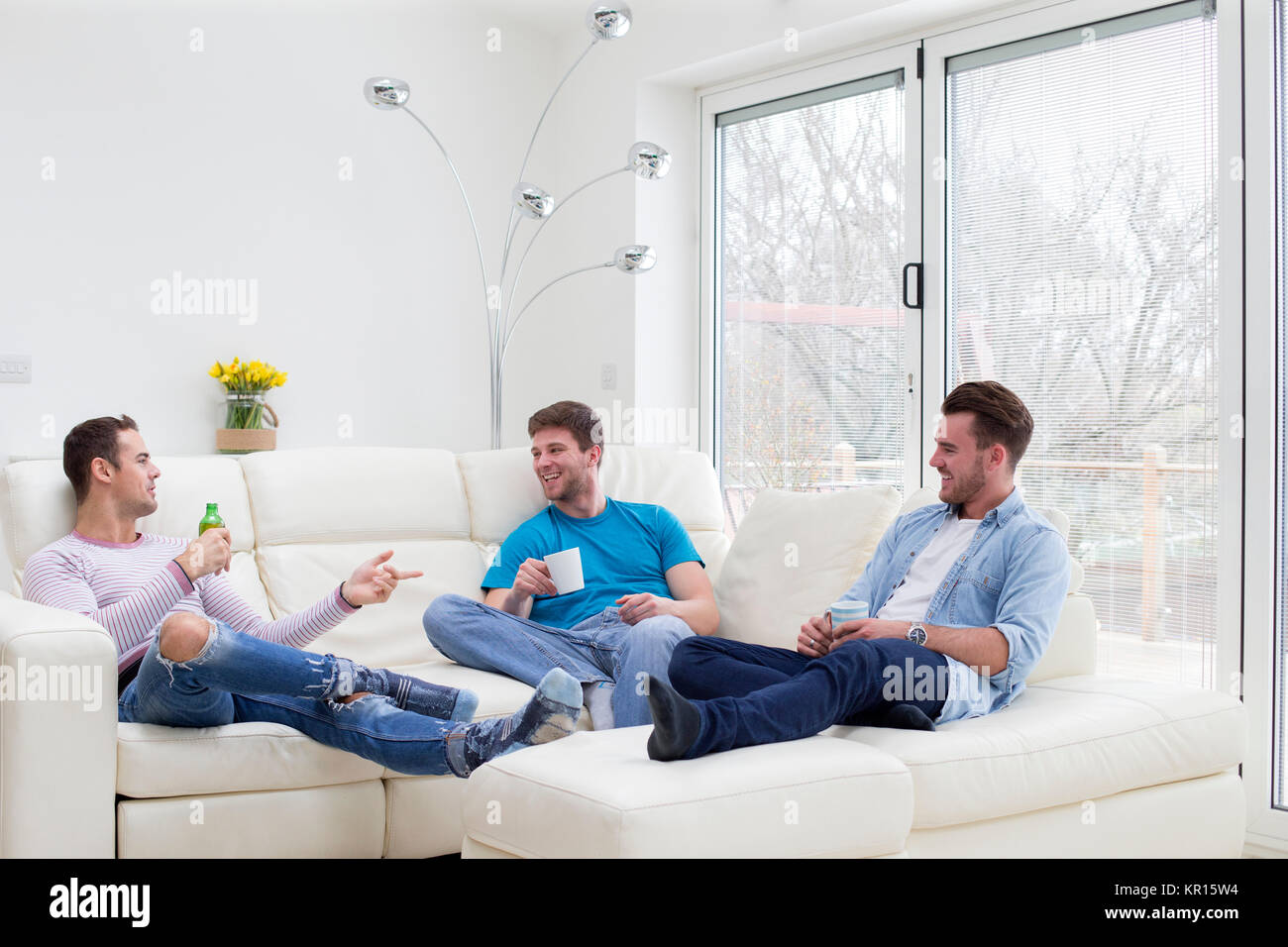 Young Men Relaxing Stock Photo - Alamy