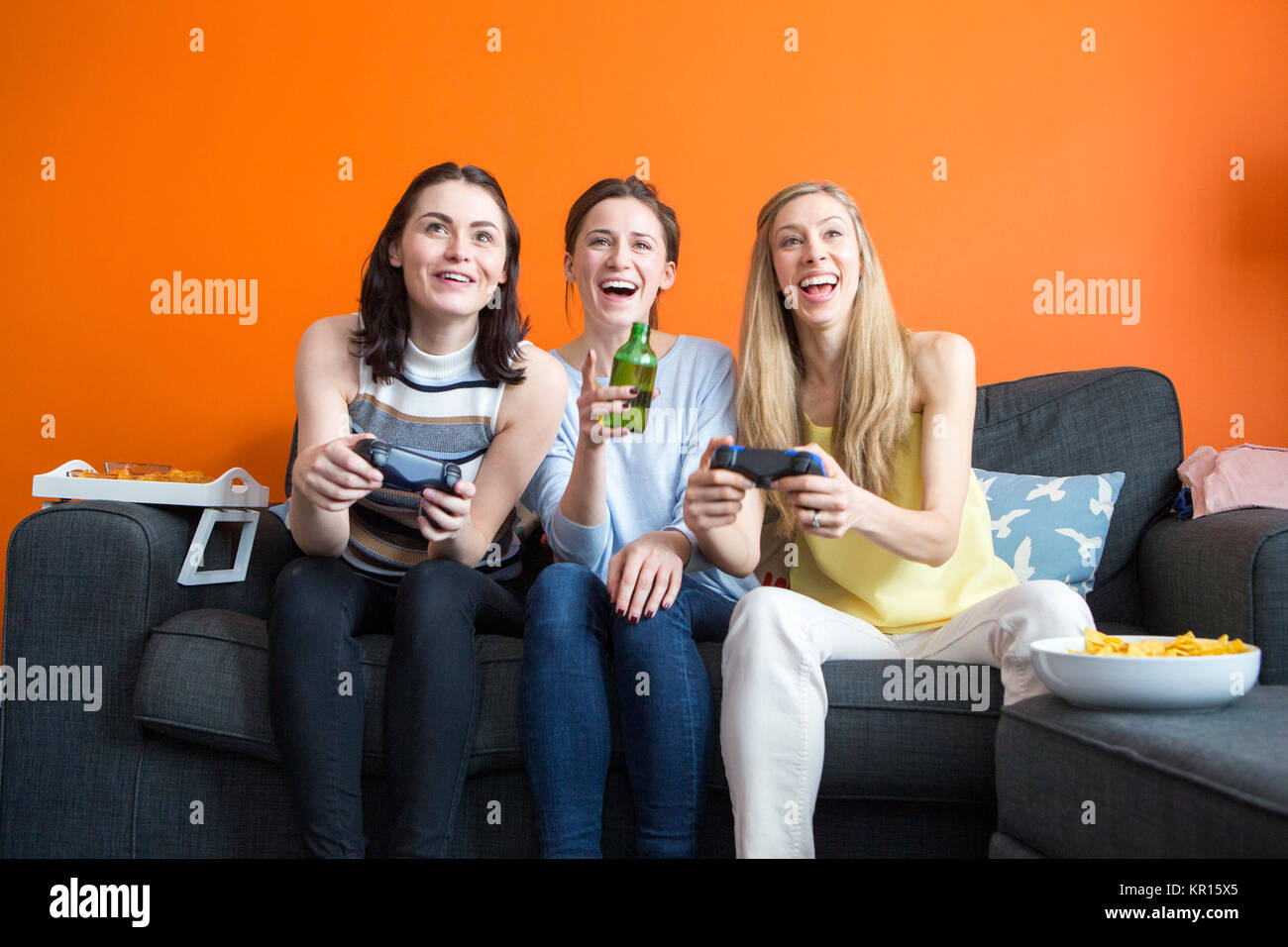 Girls playing video games Stock Photo - Alamy