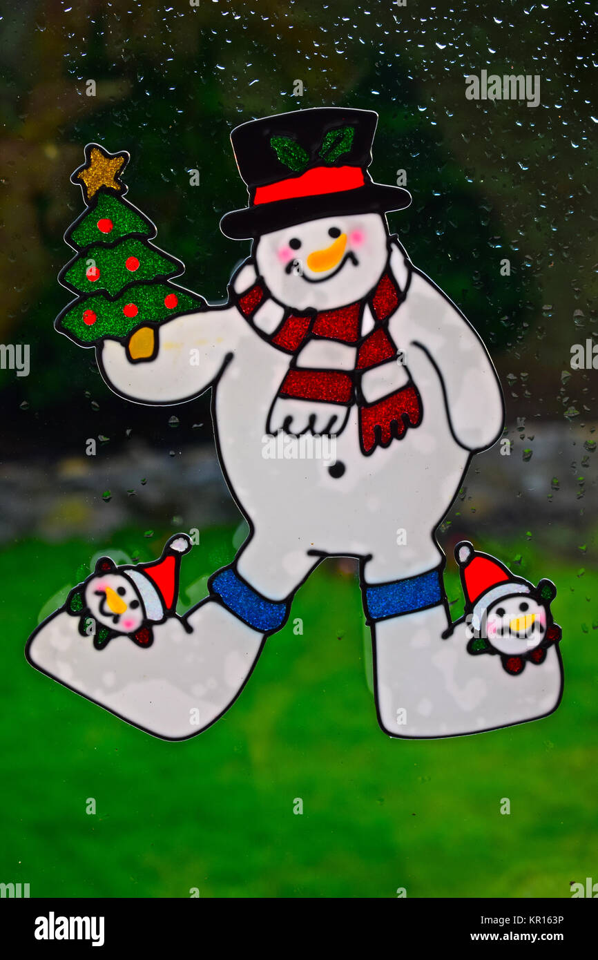 Festive snowman window sticker Stock Photo - Alamy