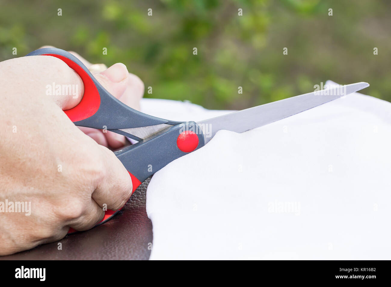 Hand cut white fabric Stock Photo - Alamy
