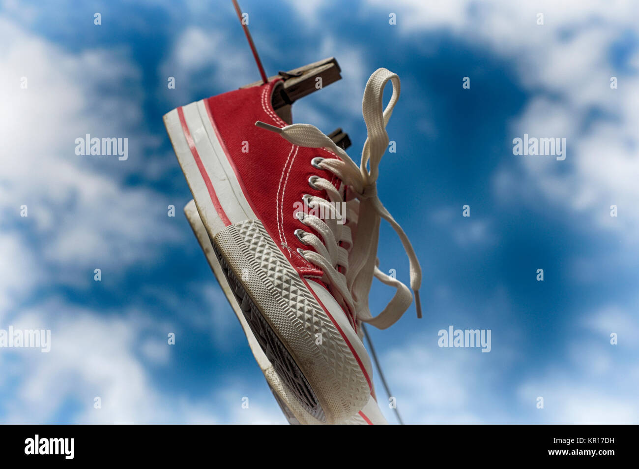 pair of red sneakers Stock Photo - Alamy