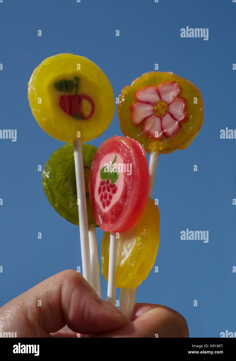 melting lollipops in sunlight Stock Photo - Alamy