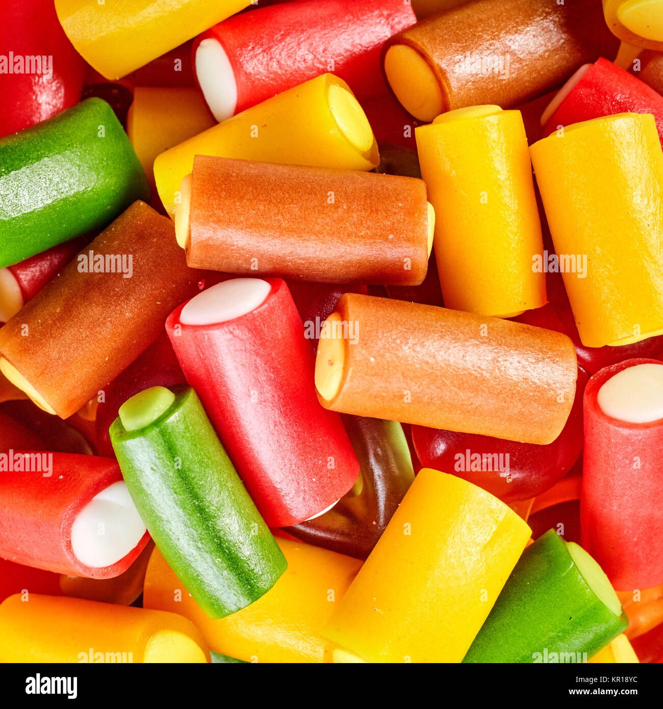 Close up overhead view of colorful candy pieces filled with yummy sweet ...