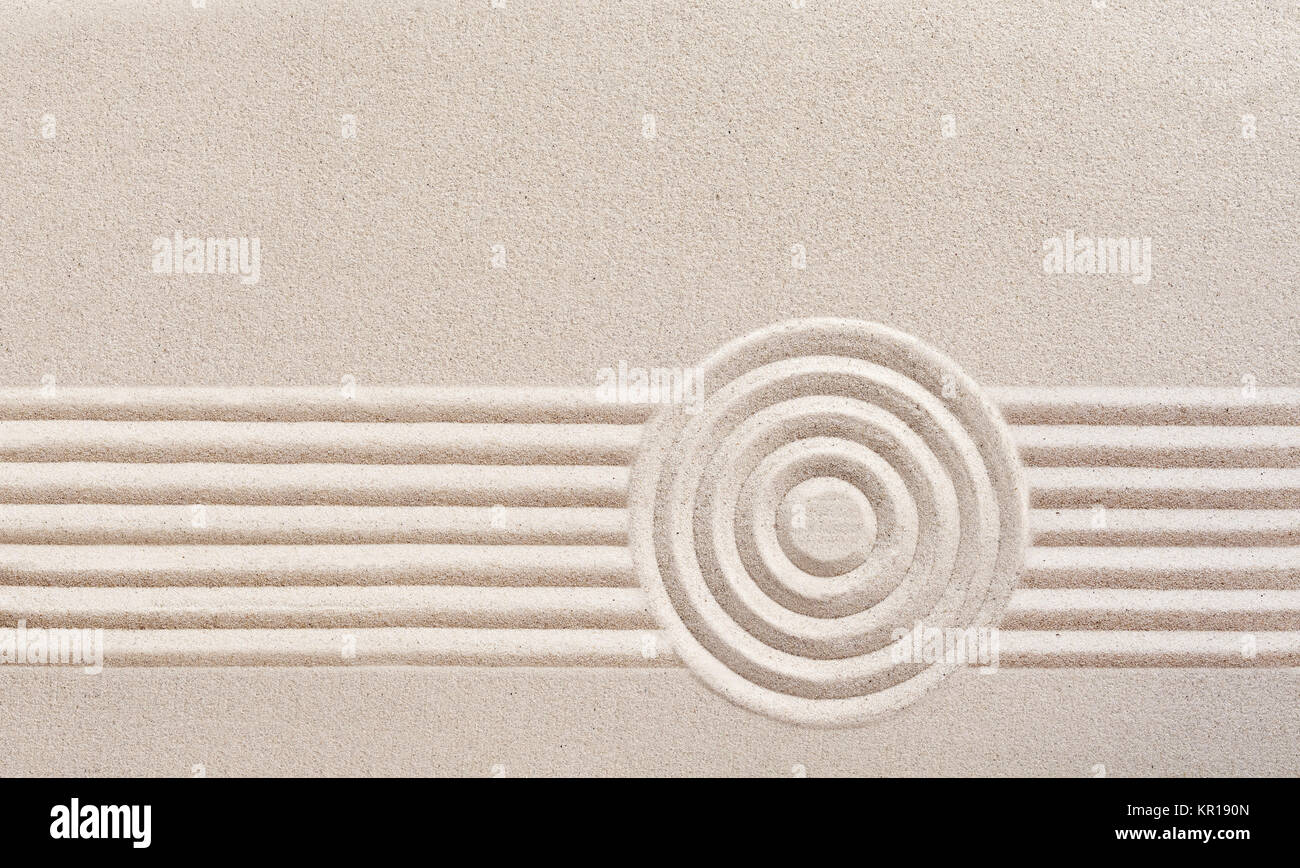Japanese zen garden with raked sand in a minimalist pattern of parallel ...