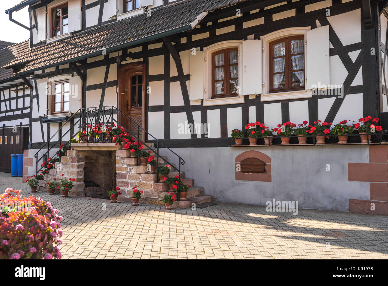 half-timbered houses with flower decoration in Hunspach, small village ...