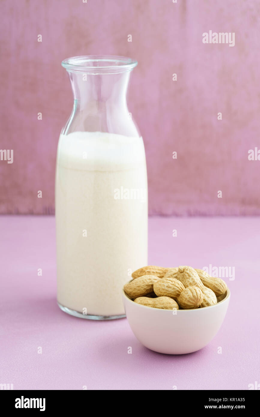 Peanut milk in a bottle Stock Photo - Alamy