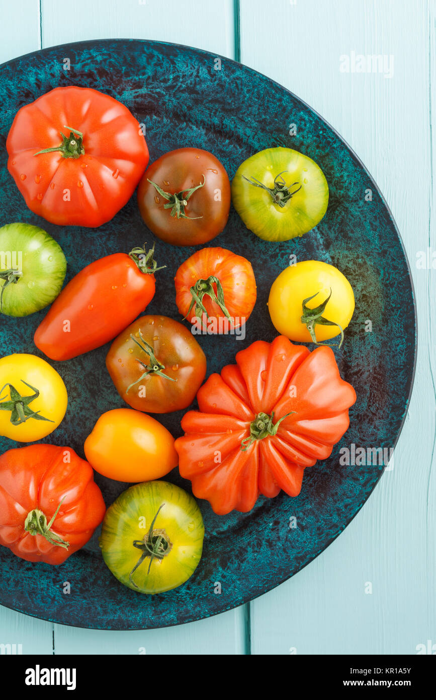 Assortment of fresh French heirloom tomatoes on a platter Stock Photo ...