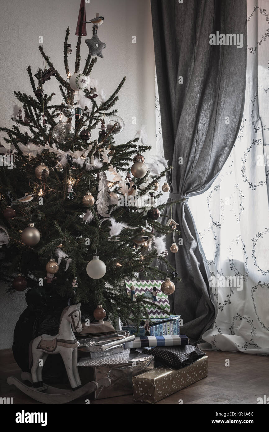 Wrapped gifts under a Christmas tree Stock Photo - Alamy